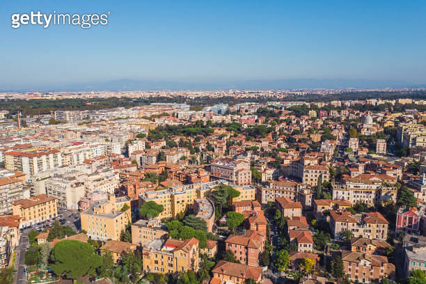 Residential area with buildings in Rome, Italy. Many orange and yellow ...