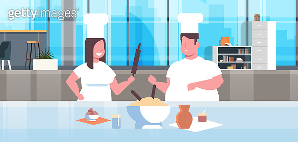 obese cooks couple preparing tasty meals overweight man woman chefs in ...