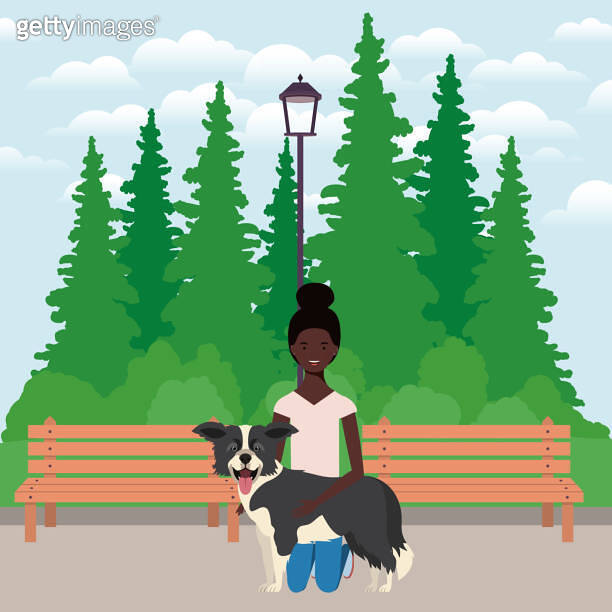 young afro woman lifting cute dog in the field 이미지 (1184194709) - 게티이미지뱅크