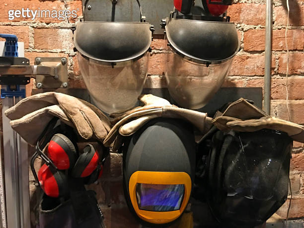 Collection of welder and grinder safety helmets/face masks, gloves and ...