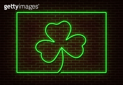 Neon green Shamrock with frame sign vector isolated on brick wall ...