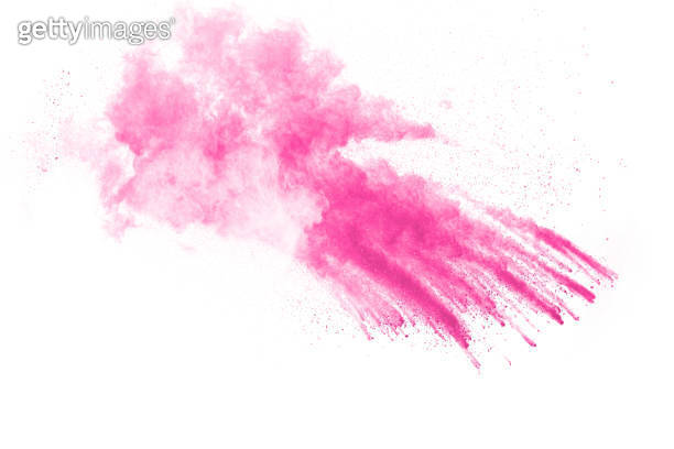 Pink powder explosion on white background. Freeze motion of pink dust ...