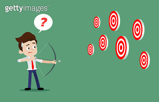 Businessman holding bow and arrow and confused with multiple targets ...