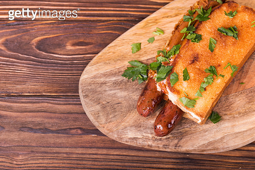 Double hot dogs with french brioche buns and caramelized onions ...