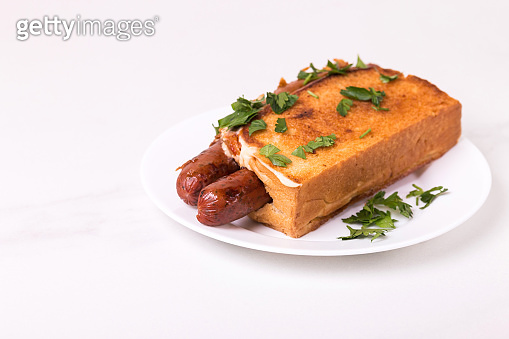 Double hot dogs with french brioche buns and caramelized onions ...