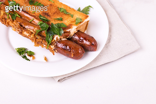 Double hot dogs with french brioche buns and caramelized onions ...
