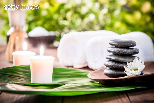 Stack of hot stones for a spa therapy (1249343665) - 게티이미지뱅크