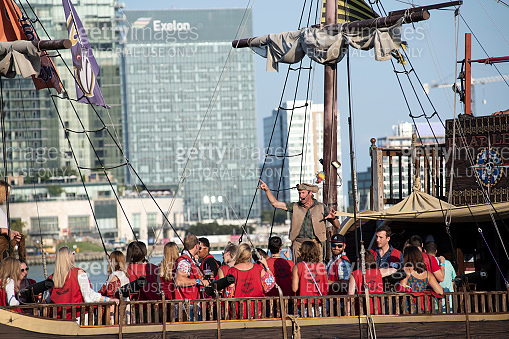 Tourists on board of the Fearless Pirate Ship Sailing Inner Harbor of ...