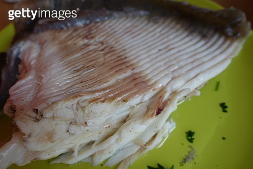 Ray wing sea fish cooked in a court-bouillon Gastronomic cooking ...
