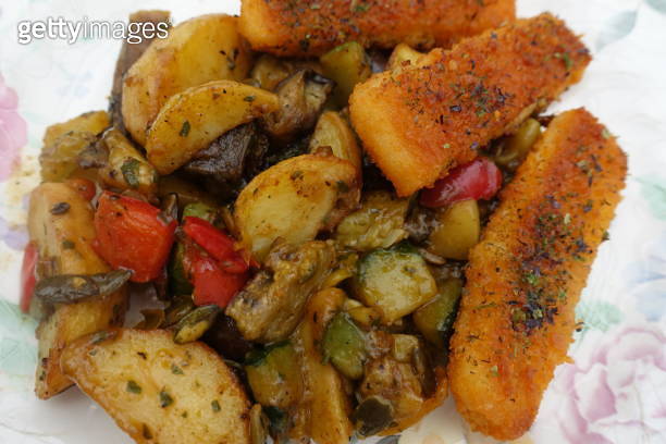 Breaded cod sticks served with a mixed vegetable stew 이미지 (1248878564 ...