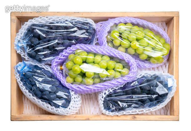 Sweet Green grape and Black grape in packaging ready to export isolated ...