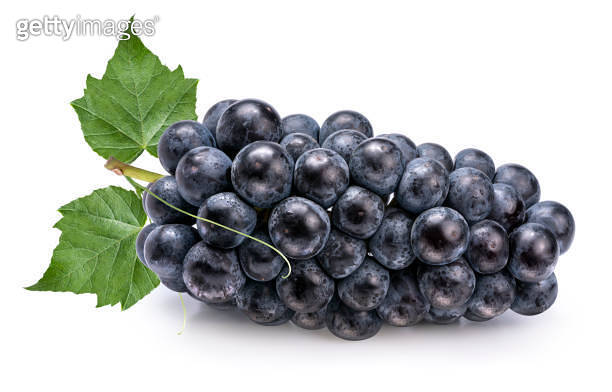 Wine grape with leaves isolated on white. Kyoho Grape isolated on white With clipping path ...