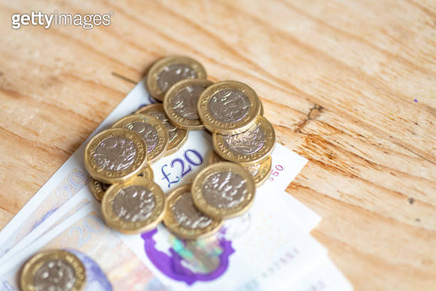 New Twenty pound note released 20 Feb 2020 surrounded by pound coins ...