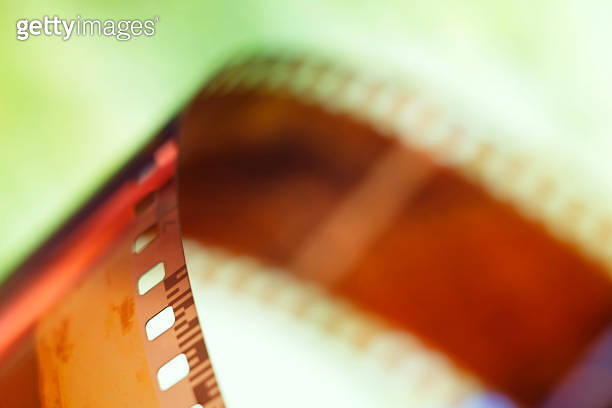 Color negative film in blur. 35mm negative film. Photographic film view ...