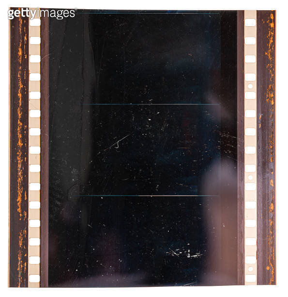 real macro photo of original 70mm film material or strip on white ...