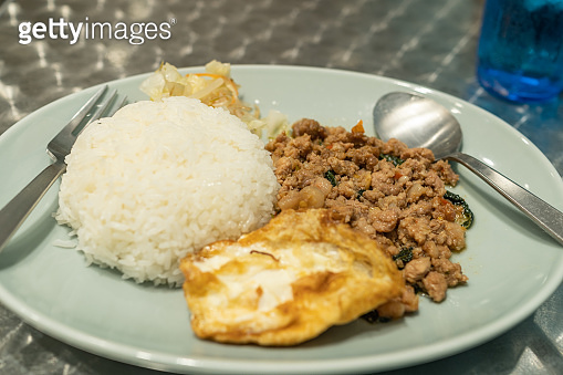 Thai local food, gapao rice, rice served with minced chicken or pork ...
