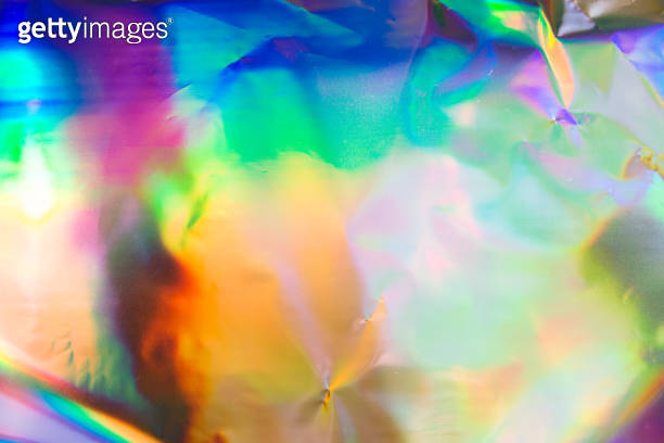 Abstract blurred holographic iridescent mermaid foil texture background ...