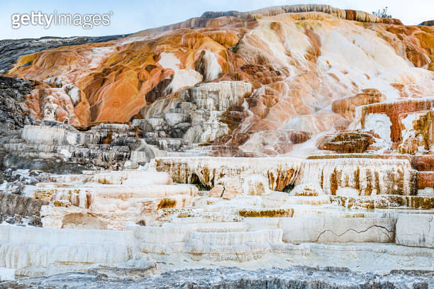 Geothermal flow of hot, carbonate rich water, forms cascading, dark ...