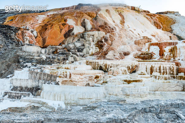 Geothermal flow of hot, carbonate rich water, forms cascading, dark ...