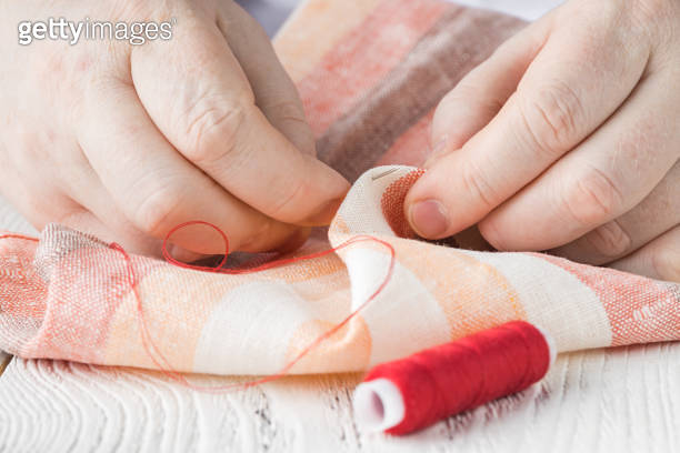 people, needlework, sewing and tailoring concept - tailor man with ...