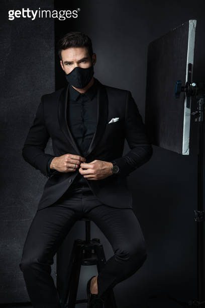 Well dressed gentleman having photoshooting in studio 이미지 (1273386034 ...