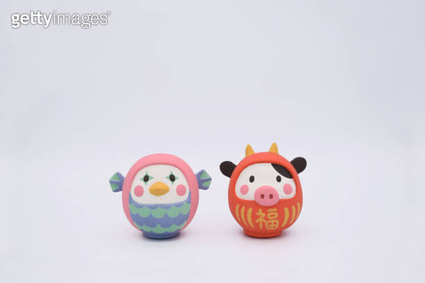Clay sculptures of traditional Japanese characters "Amabie" and "Daruma ...