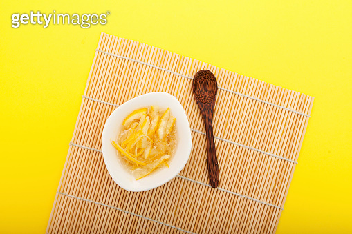 Lemon or Yuja fruit slices with honey and sugar. Ingredient for Yuzu ...