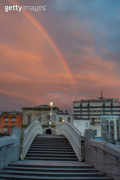 Dramatic sunset and rainbow over Dublin City, Ha'penny Bridge, Dublin ...