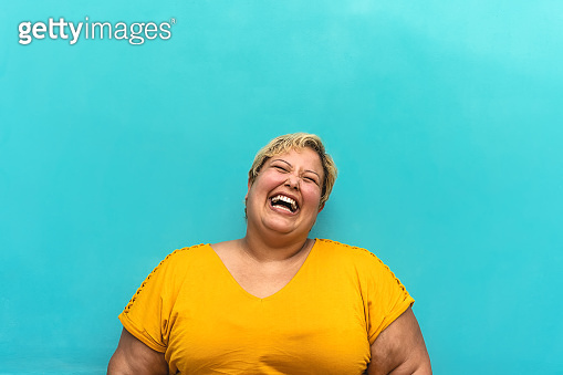 Happy plus size woman portrait - Curvy overweight model having fun ...