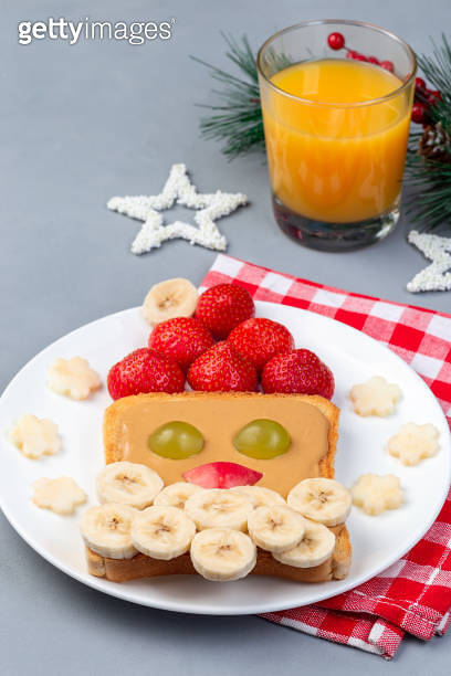 Sandwich with Santa made from toast, peanut butter, strawberry, banana ...