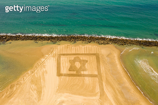 Flag of Israel designed in beach sand for independence day during ...