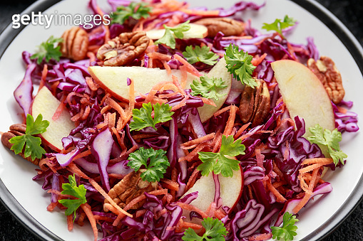 Red Cabbage salad with carrots, apples and pecan nuts. Healthy vegan ...