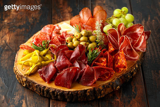 Dry cured fermented beef and pork meat cocktail selection with salami ...