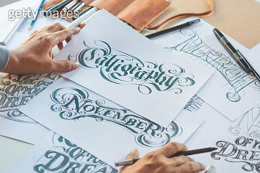 Typography Calligraphy artist designer drawing sketch writes letting ...