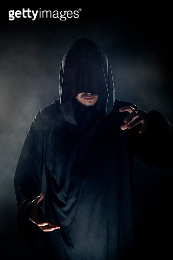 Cult Leader Wearing a Dark Robe with Smoky Background 이미지 (1191790241 ...