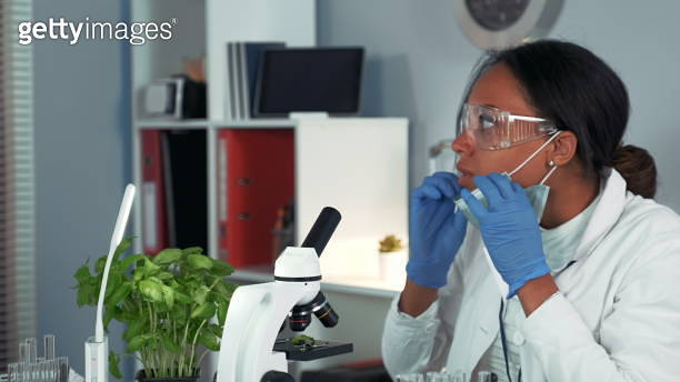 Multiracial research scientist getting shocked with the result of the ...