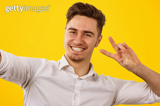 Happy man posing with fun 이미지 (1217672720) - 게티이미지뱅크