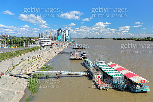 Barnaul River Station and modern buildings on the shore of Ob River ...