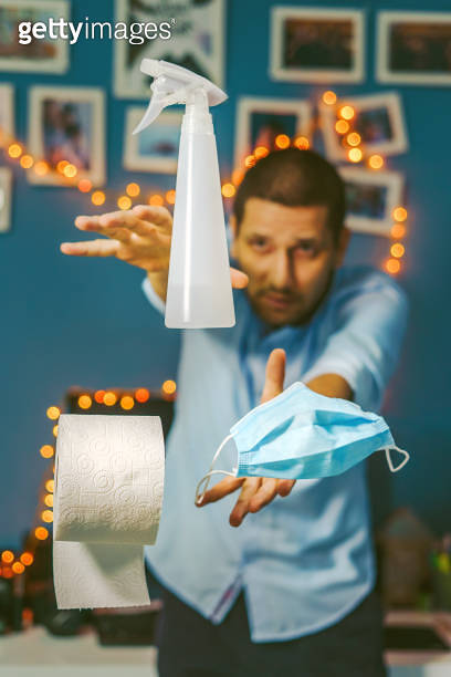 Flying levitating roll of toilet paper face protective mask and hand ...