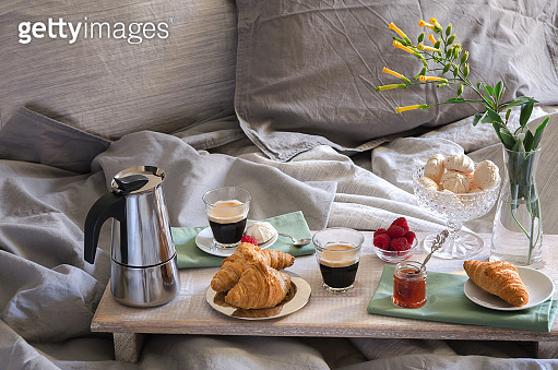 Romantic Breakfast for two in bed. Coffee maker and coffee glasses ...