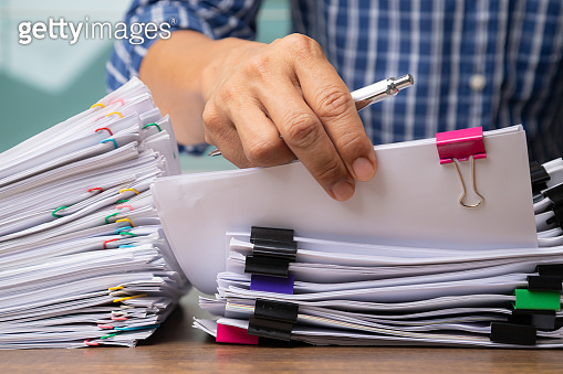 Business man hand pick up Stack overload document report paper. 이미지 ...