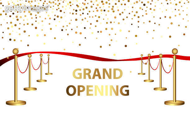 Grand opening. Golden confetti and red silk ribbon on a black ...