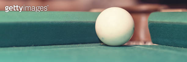 white ball near billiards pocket on pool table with green surface 이미지 ...