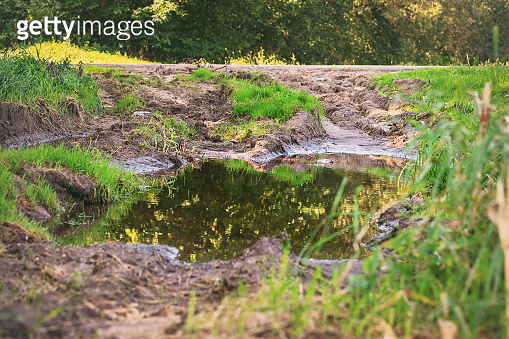 large water puddle on countryside mud road during overflow 이미지 ...
