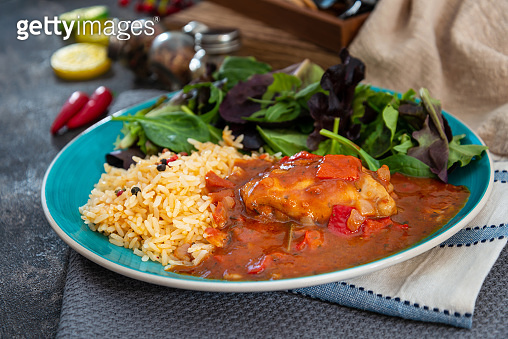 Basque Braised Chicken With Peppers and rice 이미지 (1263627326) - 게티이미지뱅크