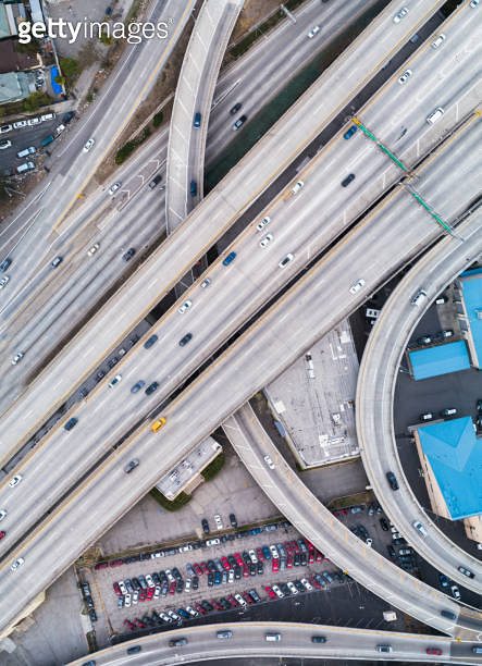 Aerial top view of the huge overpass crossing between big freeways with ...