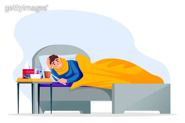 Flu sick young man lying in bed under blanket. Boy have autumn or ...