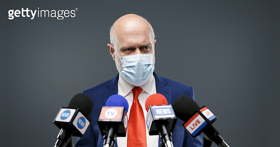 Politician wearing a surgical mask and giving a speech 이미지 (1285898554 ...