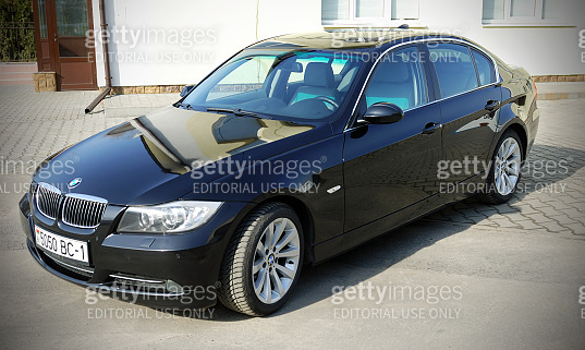 BMW 3 series E90 330i, side view. Photographing a modern car in the ...