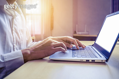 Businessman hand using laptop computer in office. 이미지 (1226332477) - 게티 ...